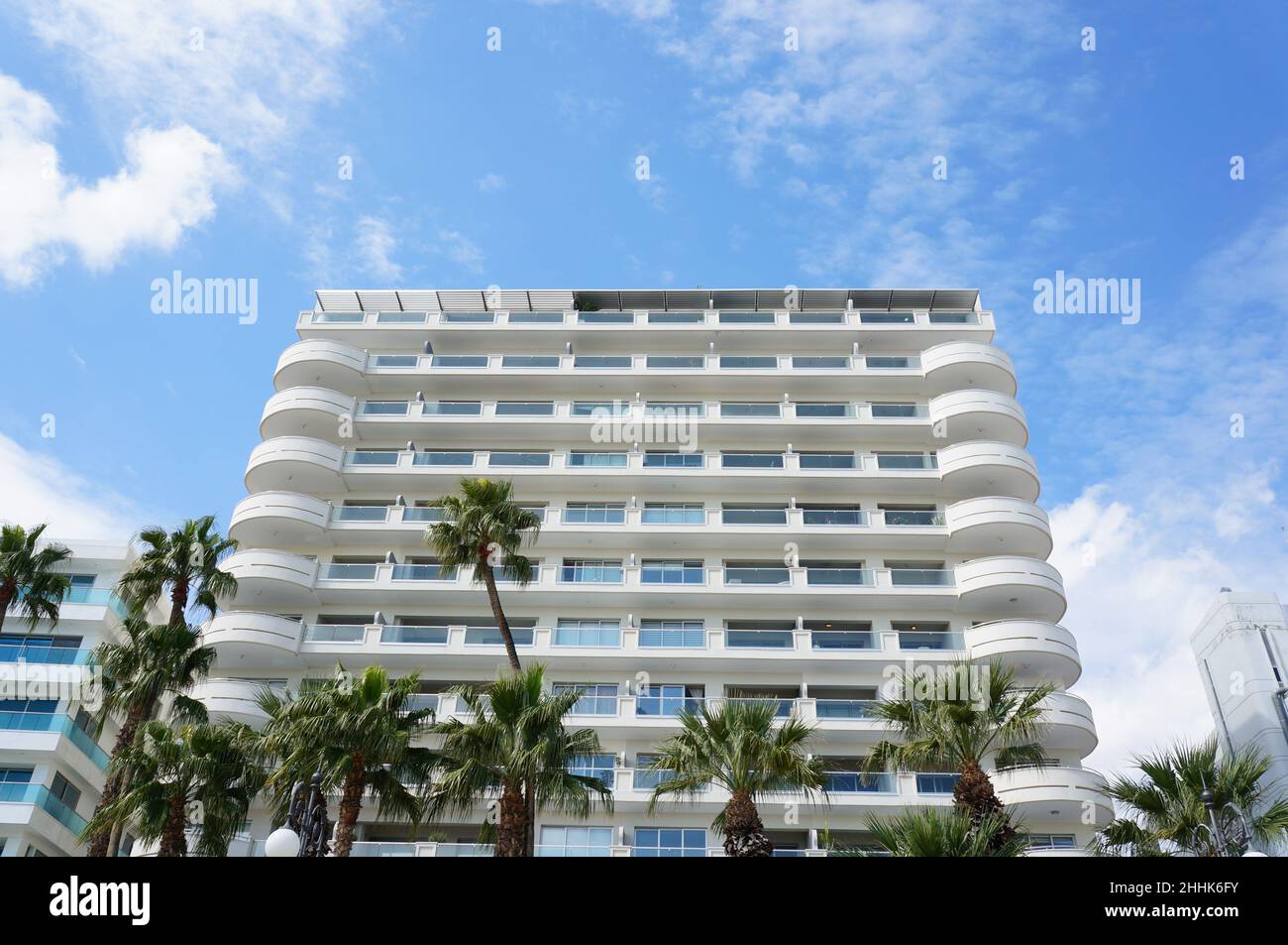 Low angle view of a tall hotel building at a seaside Stock Photo - Alamy
