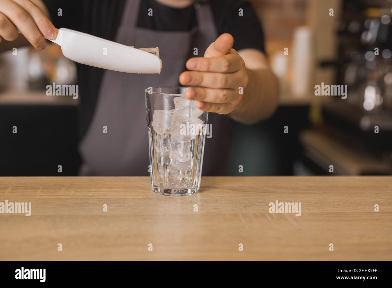 Ice cube in drink adding hi-res stock photography and images - Alamy