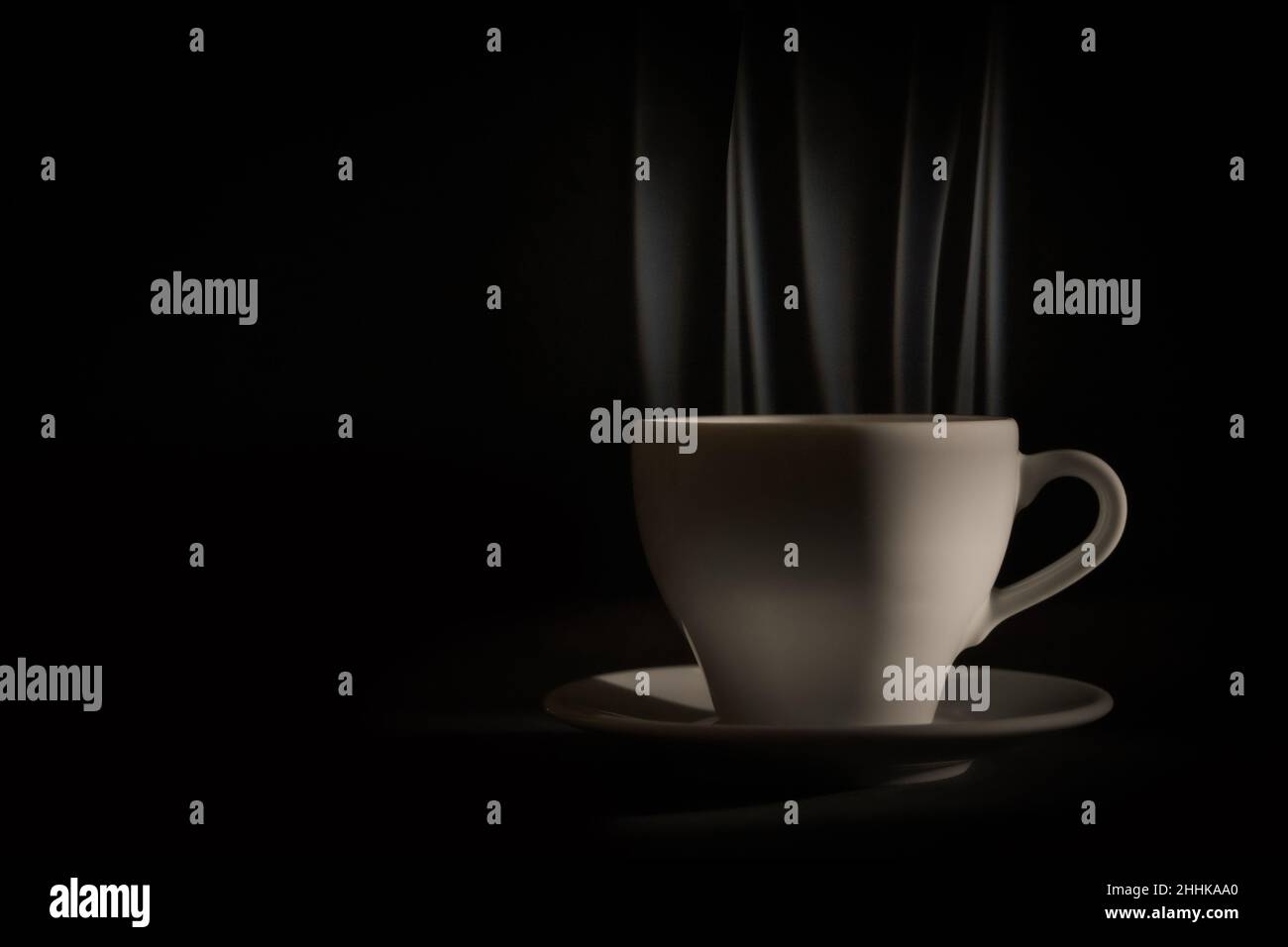 Steam is coming out of the tea cup Stock Photo - Alamy