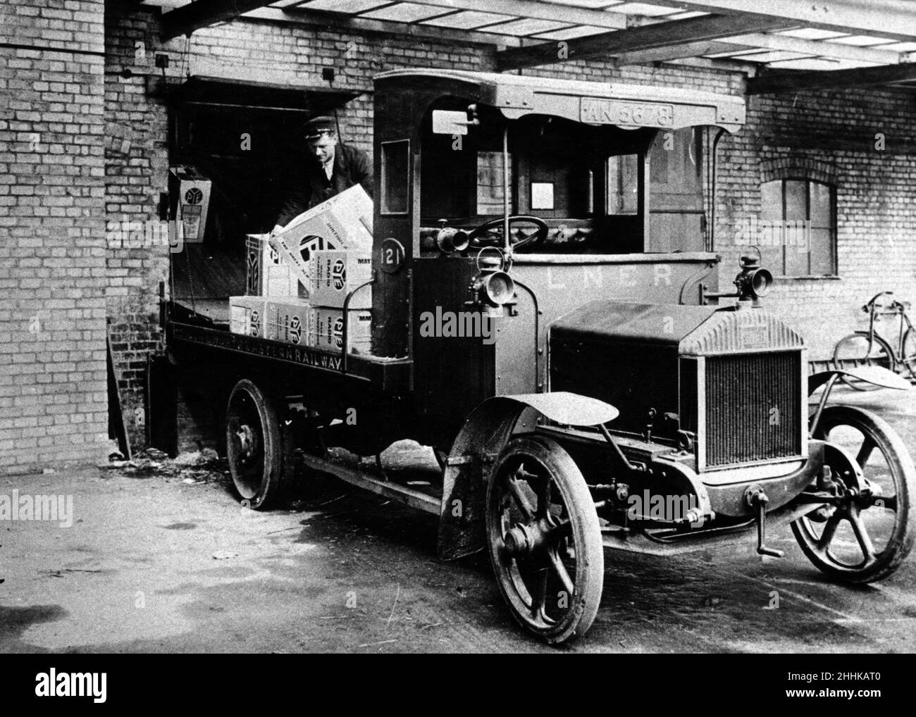 Loading Pye radios on to LNER delivery lorry. Circa 1929 Stock Photo ...