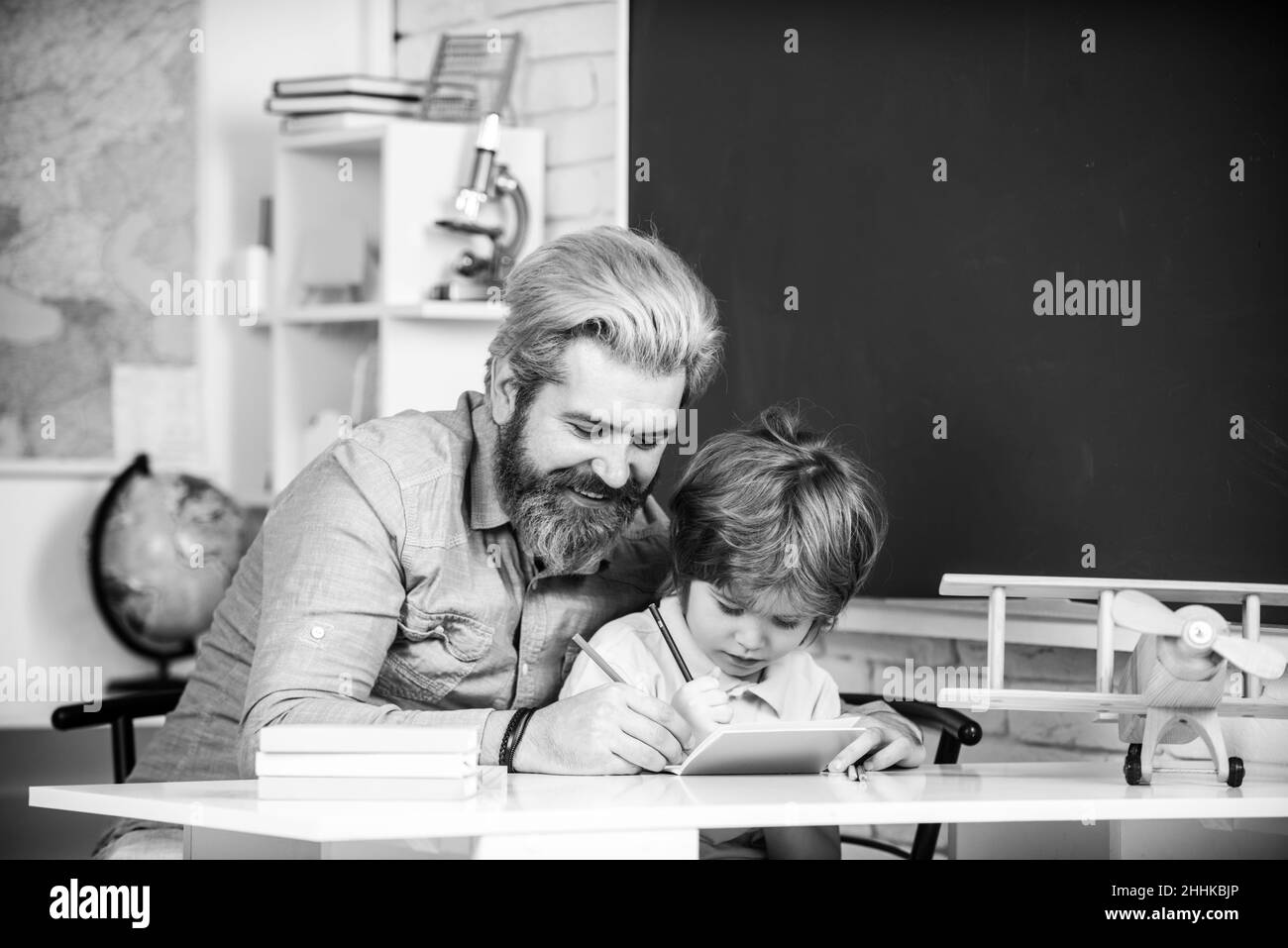 Concept of education and reading. After school teaching. Private child tutor. Elementary school ...