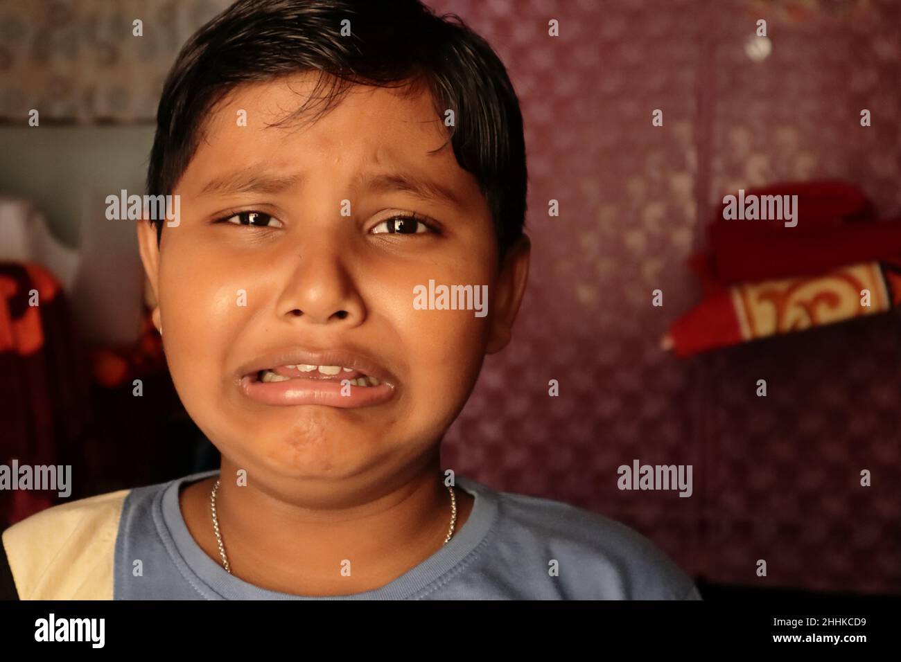Expression of sad and crying face by the kid Stock Photo - Alamy
