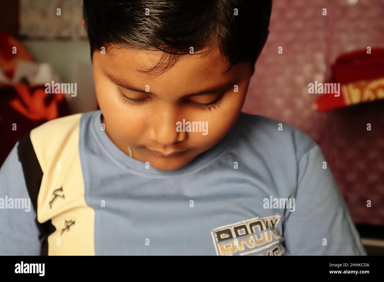 Expression of sorry face by lowering the face Stock Photo - Alamy