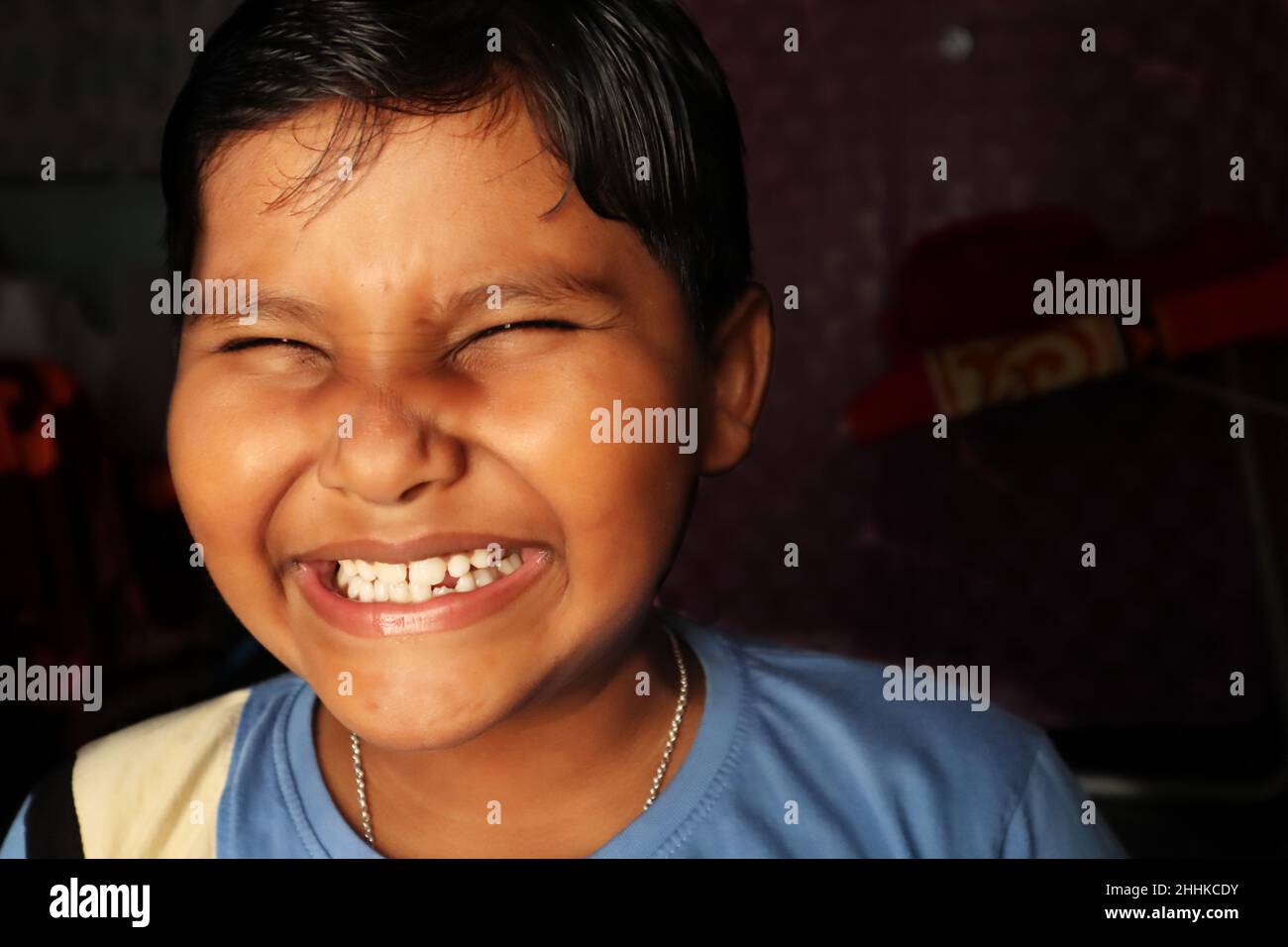 Photo of a over smiling face of a kid Stock Photo - Alamy