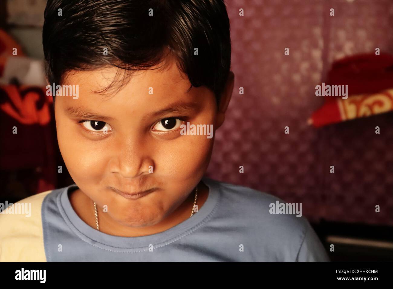Expression of Angrily disgusted face by the kid Stock Photo - Alamy