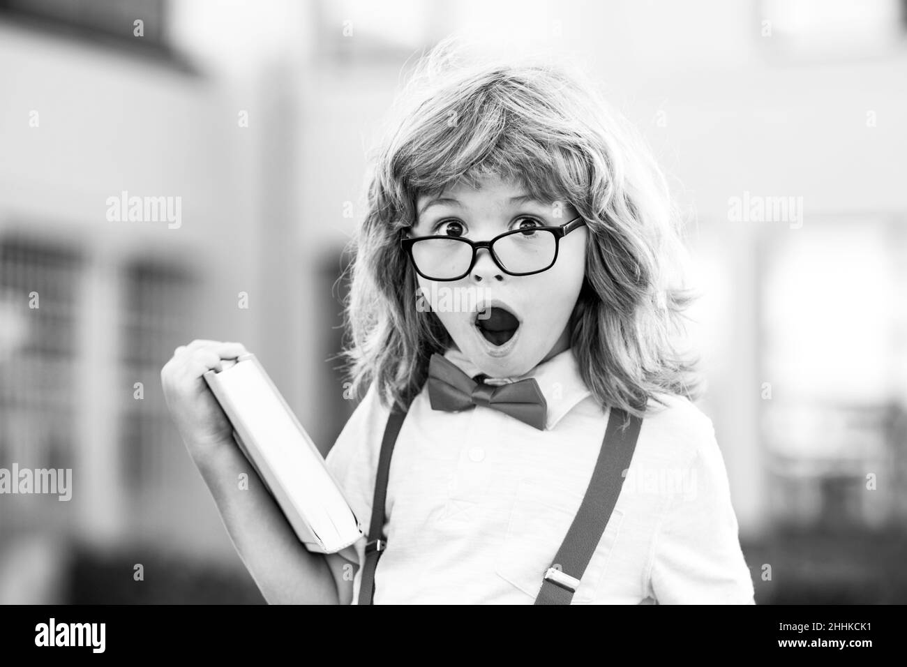 Kid glasses studying Black and White Stock Photos & Images - Alamy