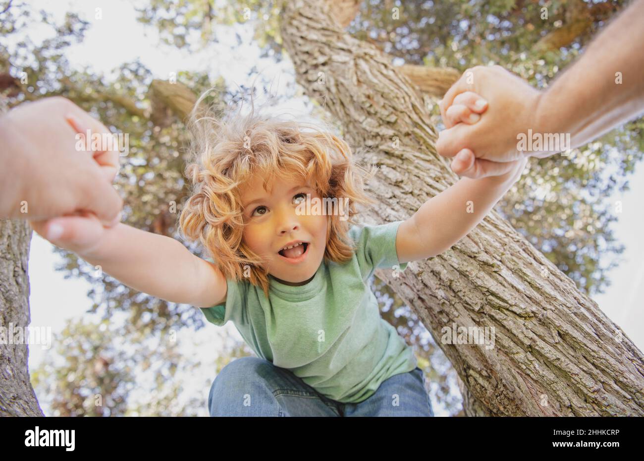 Fathers hand. Father helping son. Parent holds the hand of child Stock ...