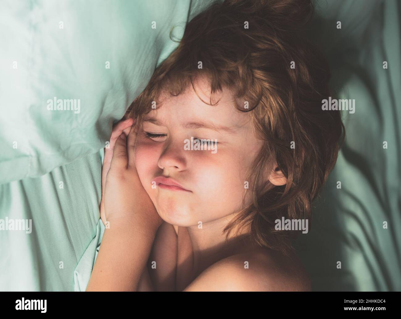 Close up portrait of six years old kids sleeping in bed Stock Photo - Alamy
