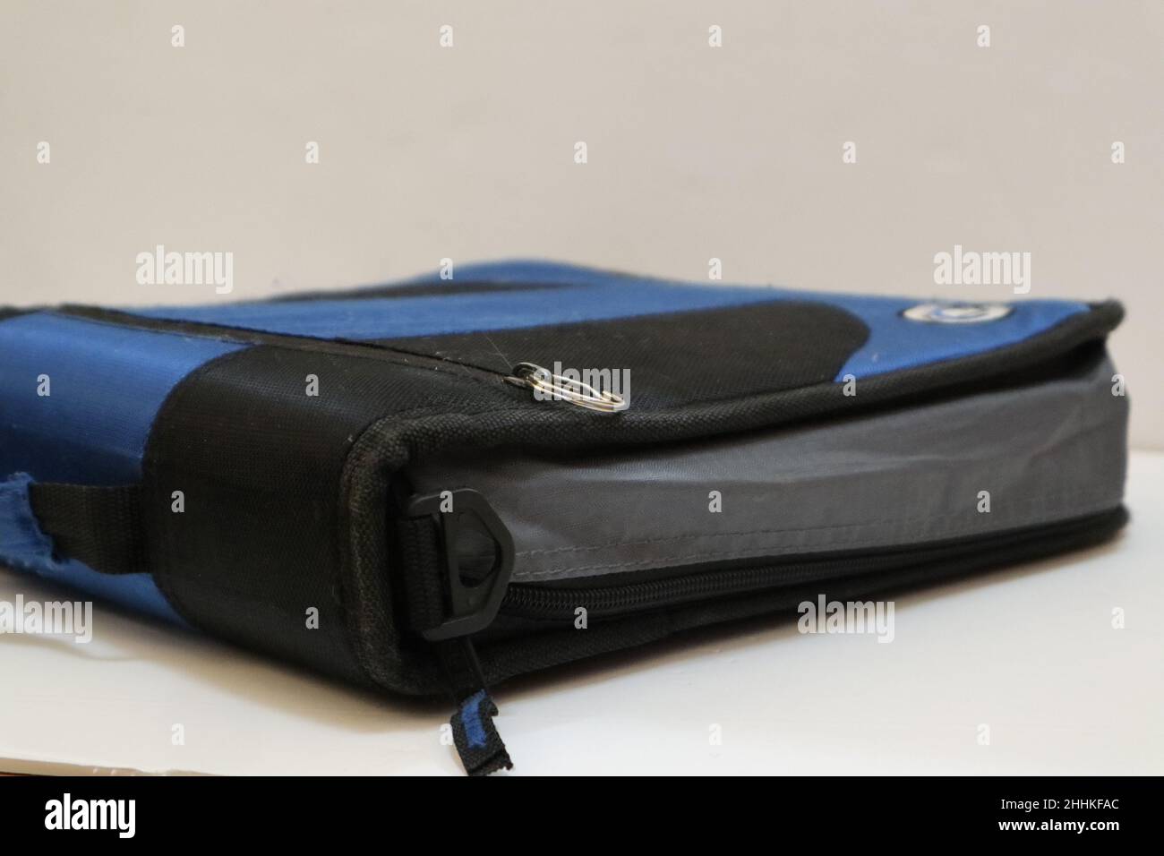 Blue trapper keeper type binder against white background Stock Photo ...