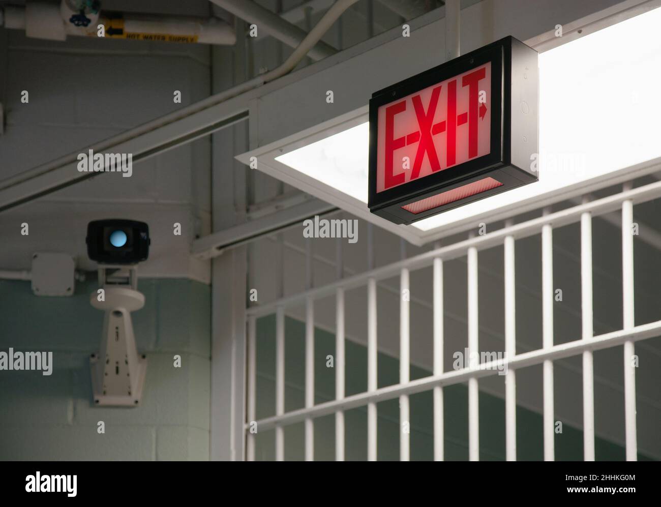 Exit sign in prison Stock Photo - Alamy