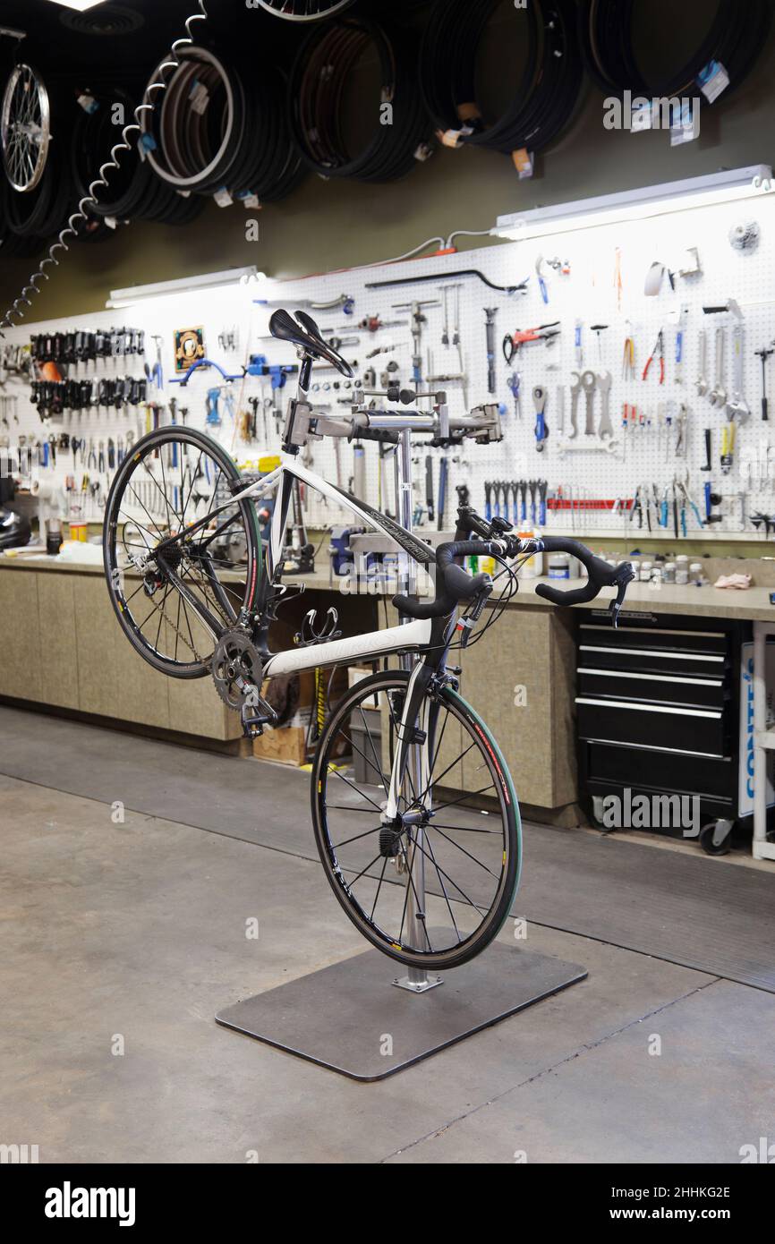 Workbench in bicycle shop Stock Photo - Alamy
