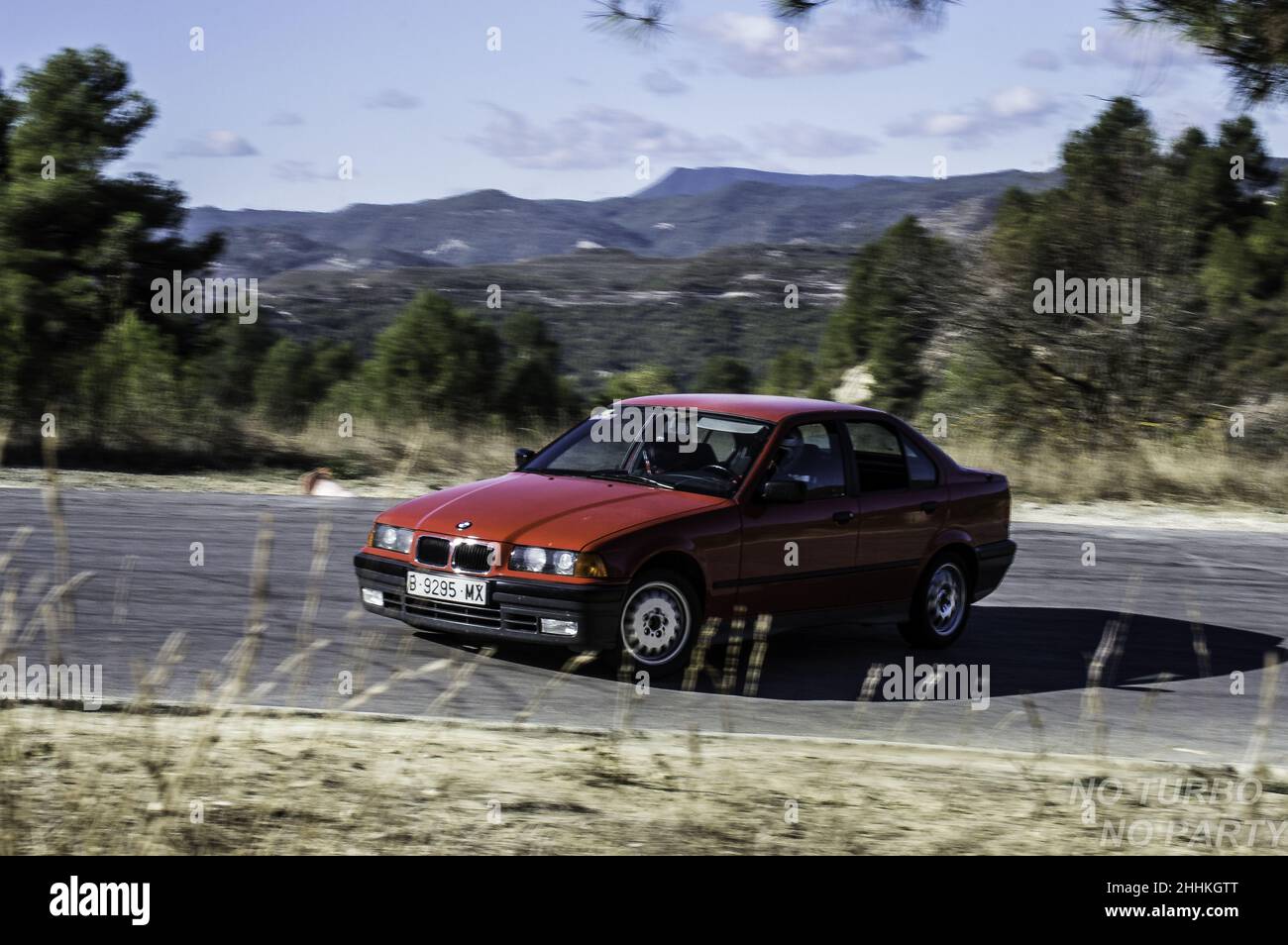 Modified BMW E36 racing on the road during a competition in Barcelona ...