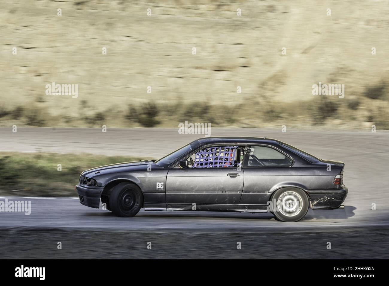 Modified BMW E36 racing on the road during a competition in Barcelona ...