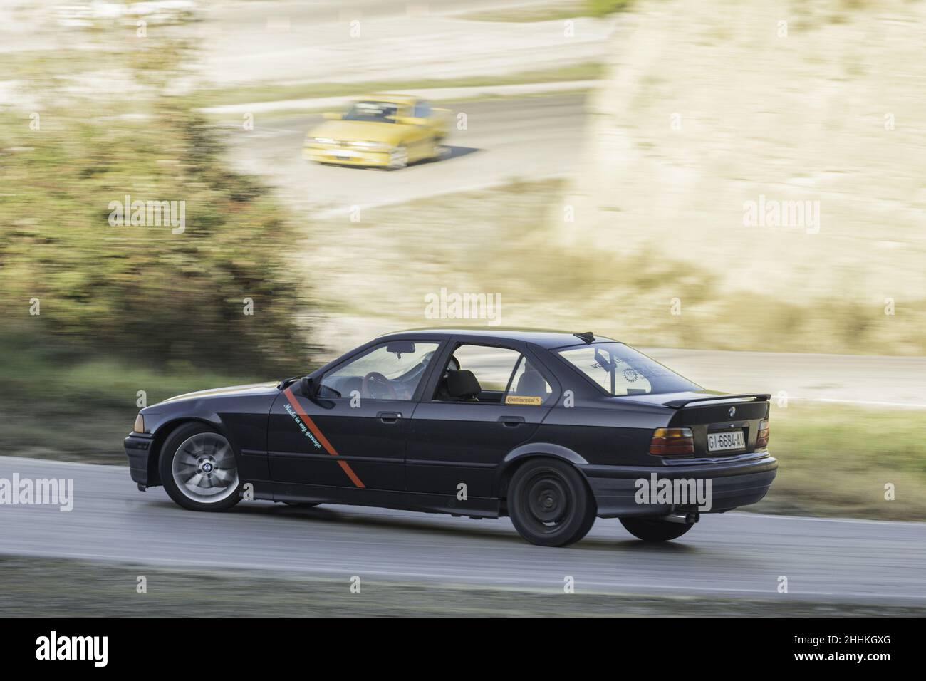 Cool modified BMW E36 racing on the road during a competition in ...