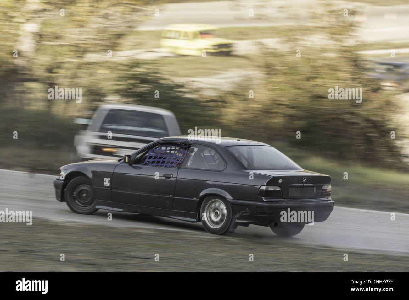 Modified BMW E36 racing on the road during a competition in Barcelona ...