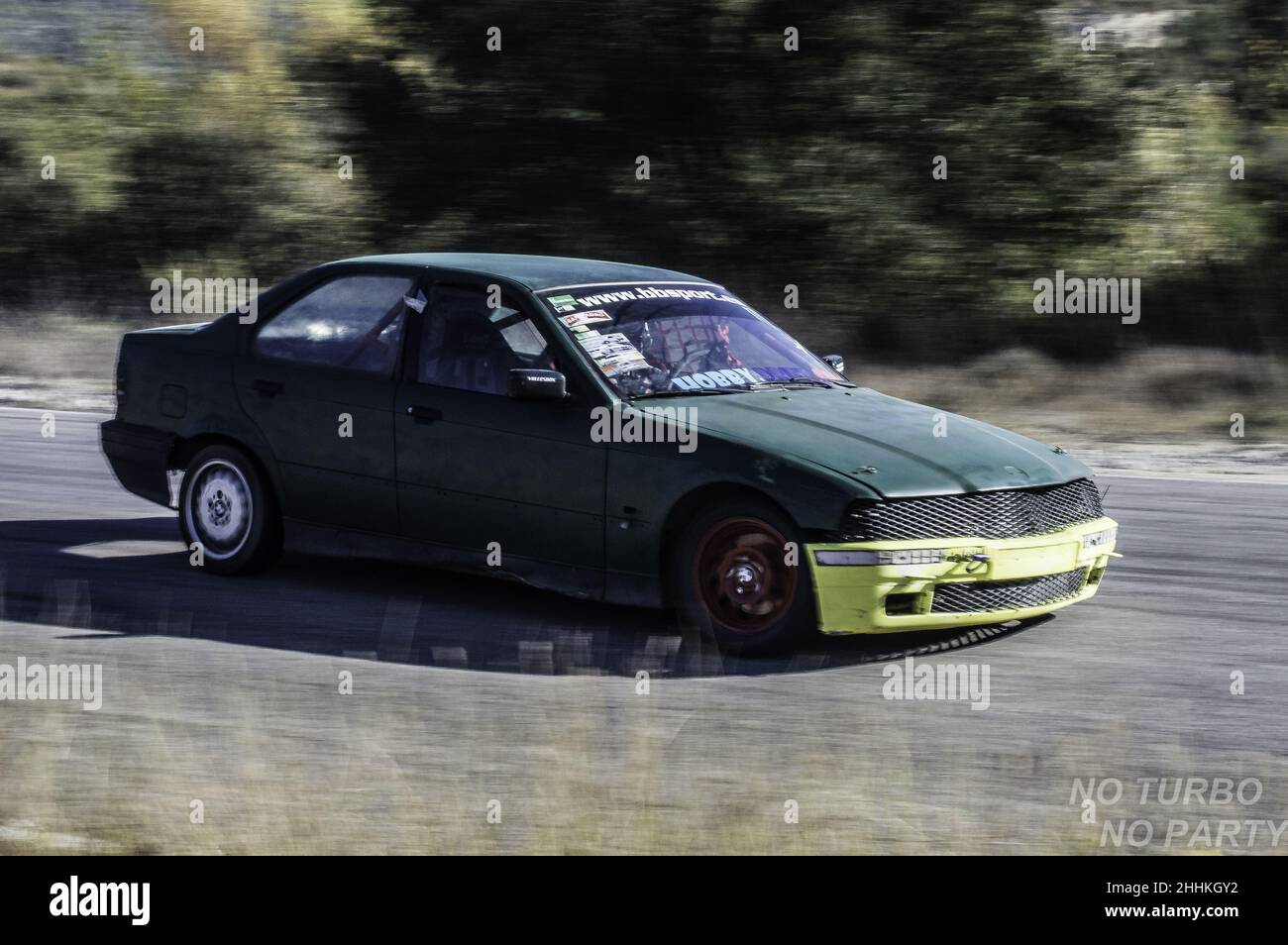 Modified BMW E36 racing on the road during a competition in Barcelona ...