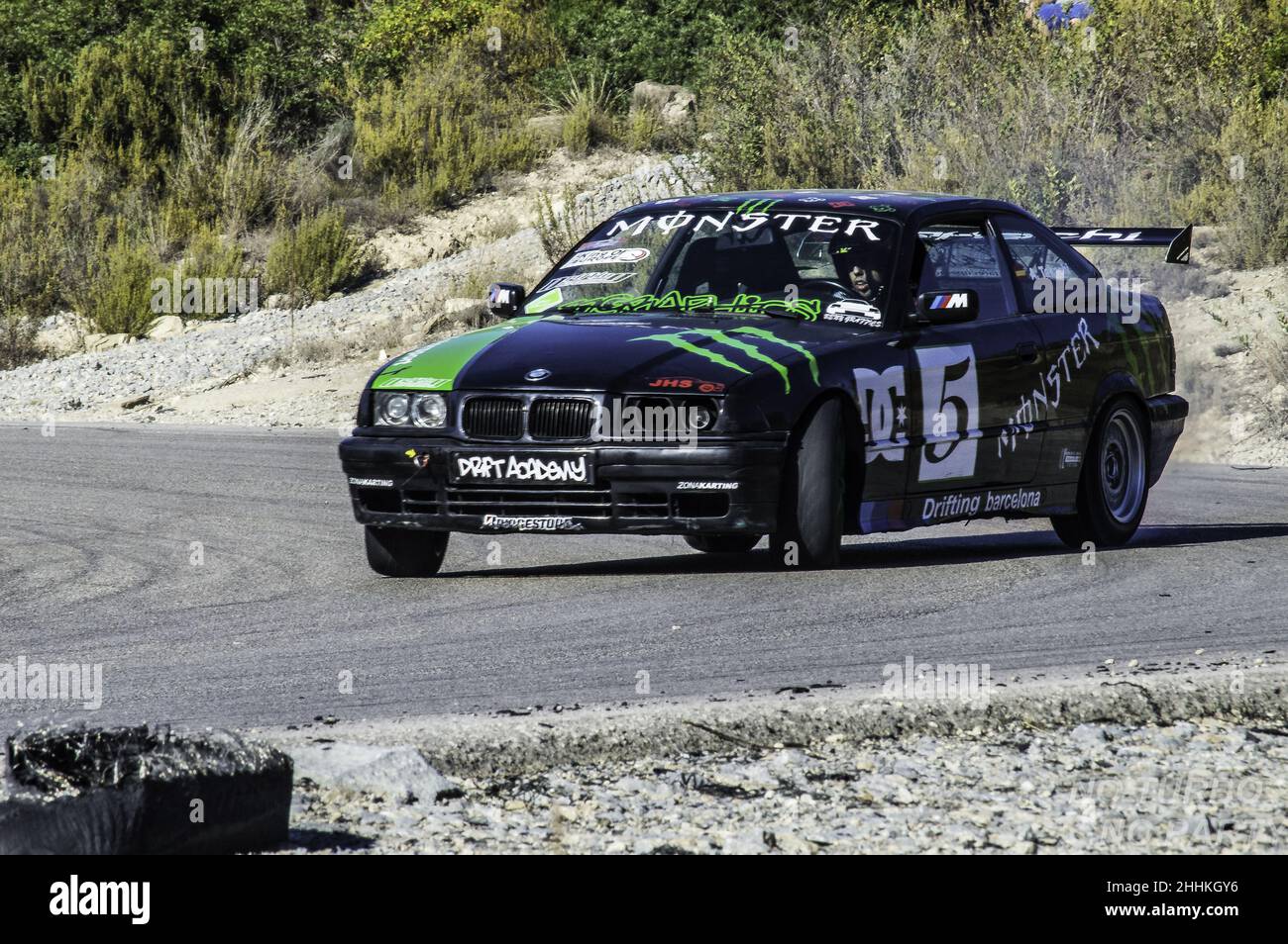 Modified BMW E36 racing on the road during a competition in Barcelona ...
