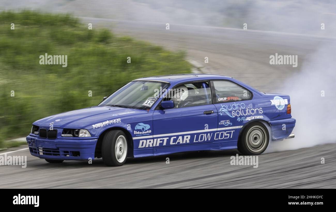Cool modified BMW E36 racing on the road during a competition in ...