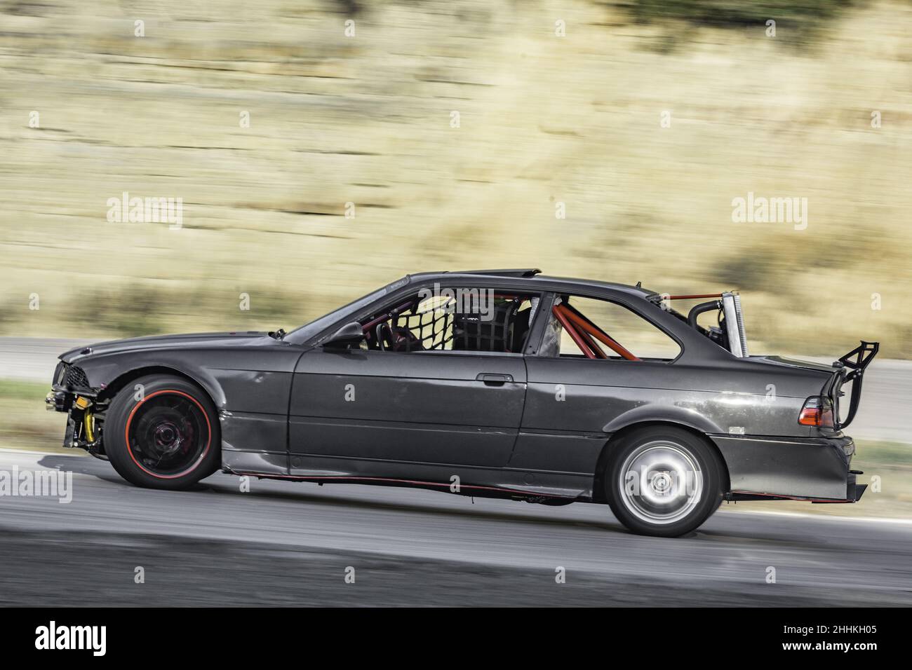 Modified BMW E36 racing on the road during a competition in Barcelona ...