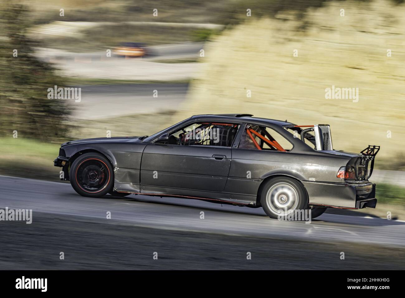 Modified BMW E36 racing on the road during a competition in Barcelona ...