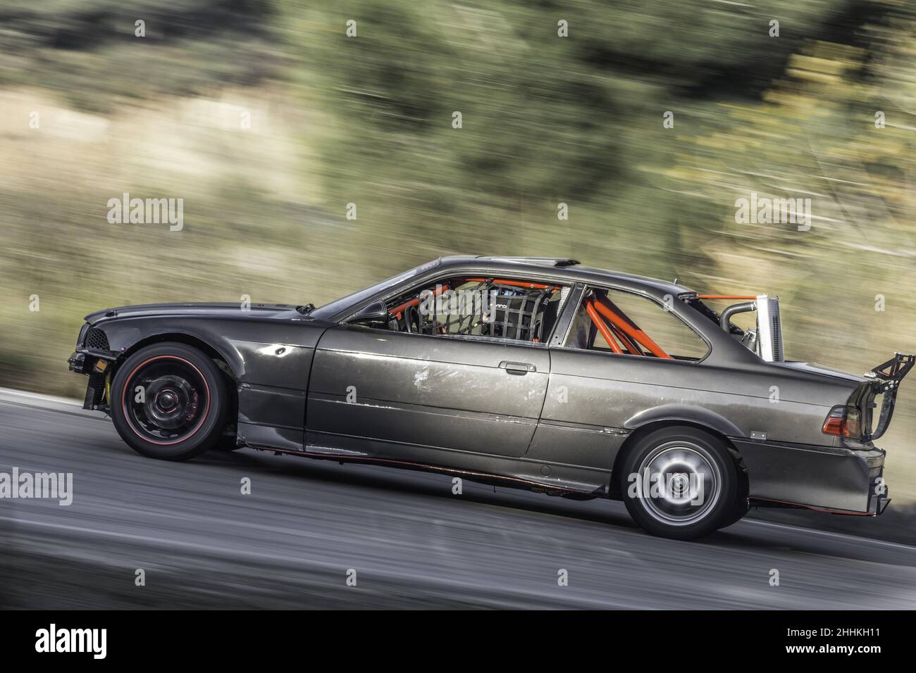 Modified BMW E36 racing on the road during a competition in Barcelona ...