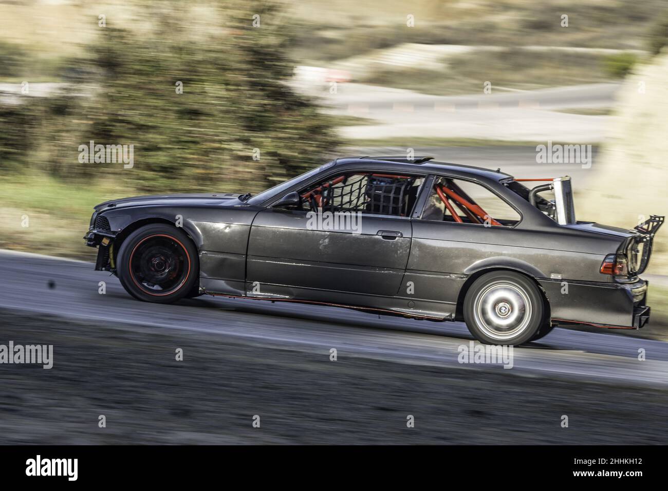 Modified BMW E36 racing on the road during a competition in Barcelona ...