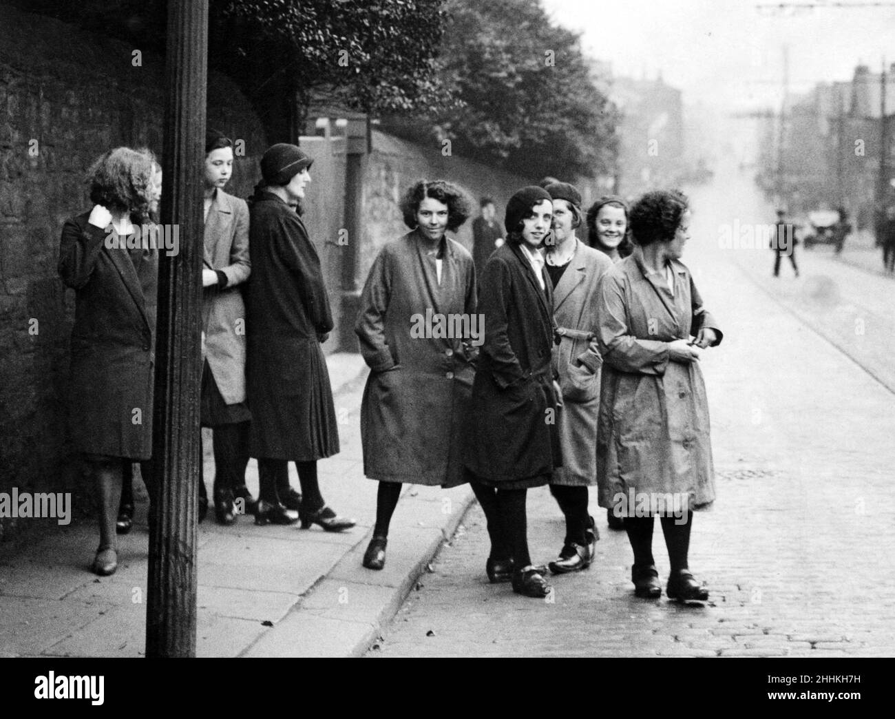 The clogs of the cotton-mill workers on the cobblestones in the street ...