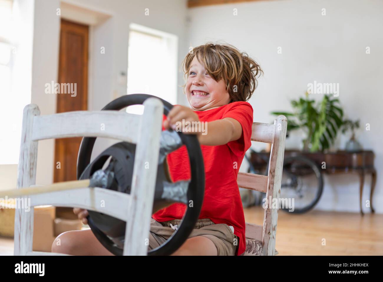 Boy playing wheel hi-res stock photography and images - Alamy