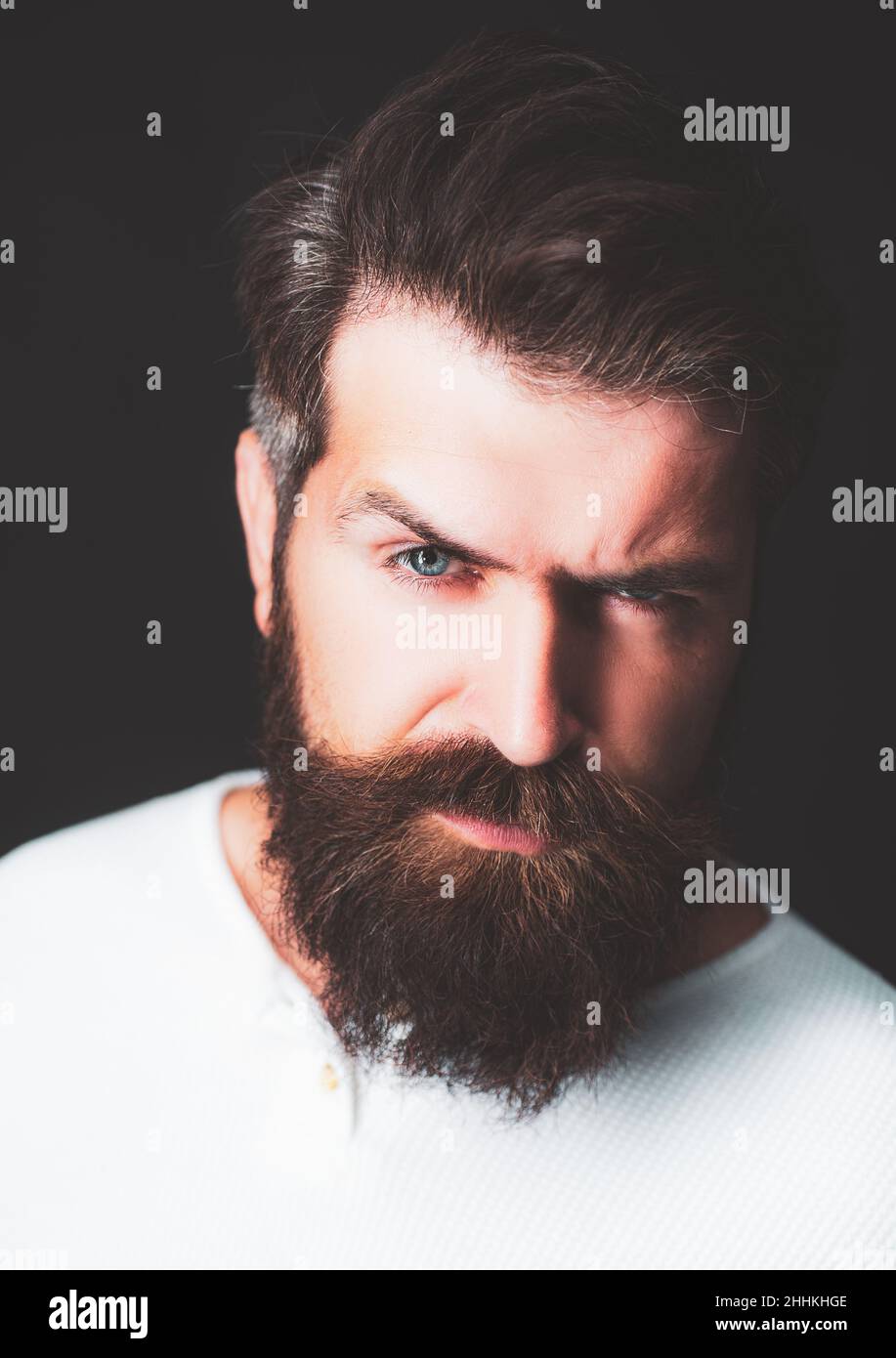 Close-up face of bearded man on black background - professional studio ...
