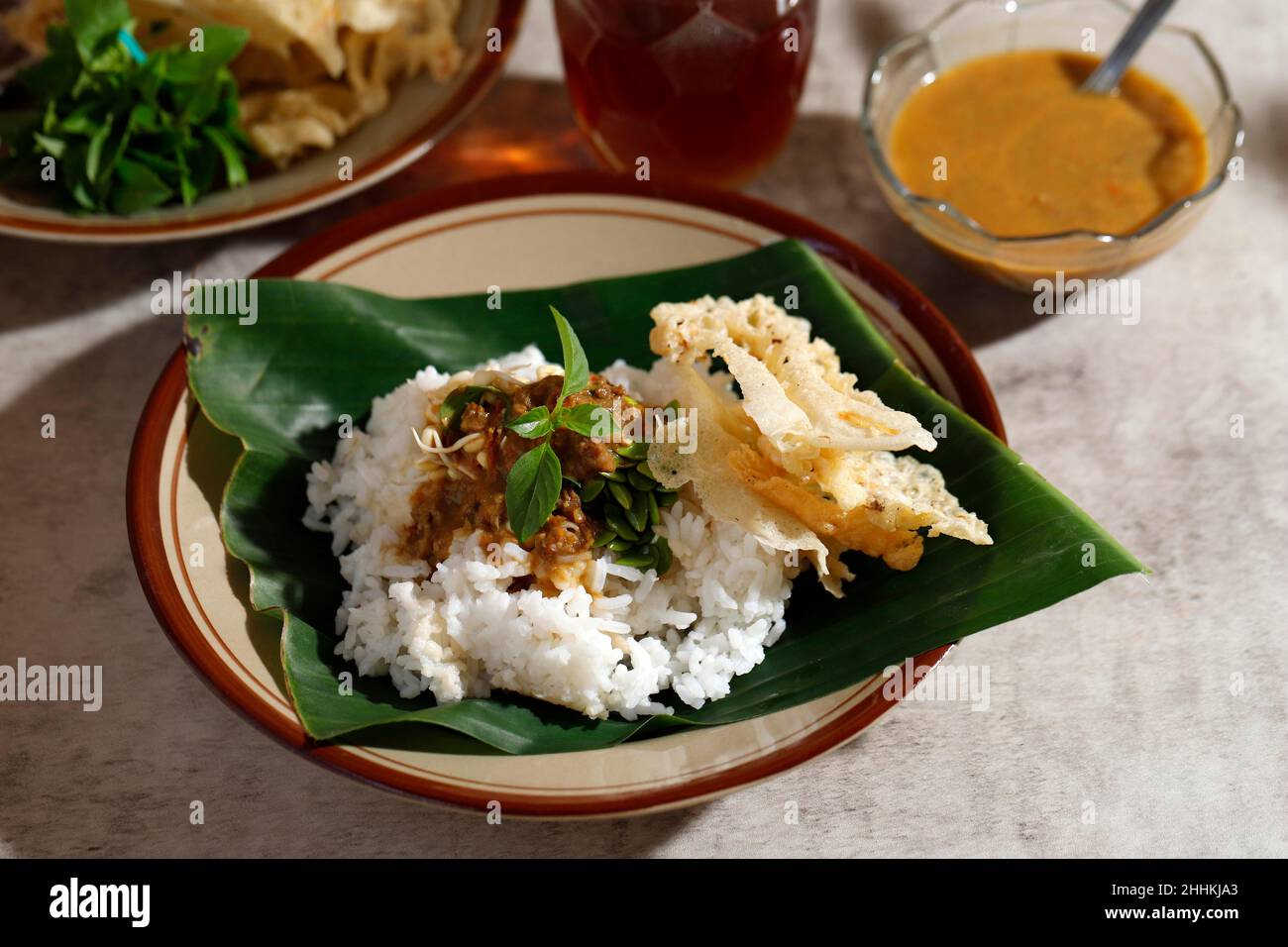 Nasi Pecel Tumpang, Traditional Breakfast with Rice Nasi Topping with ...