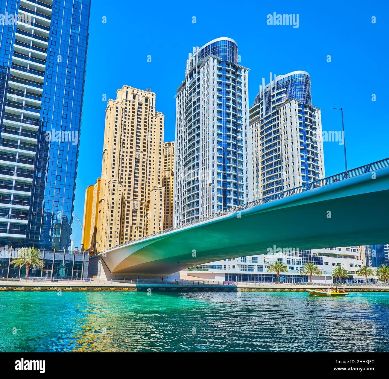 The modern glass and concrete skyscrapers behind Al Gharbi bridge ...