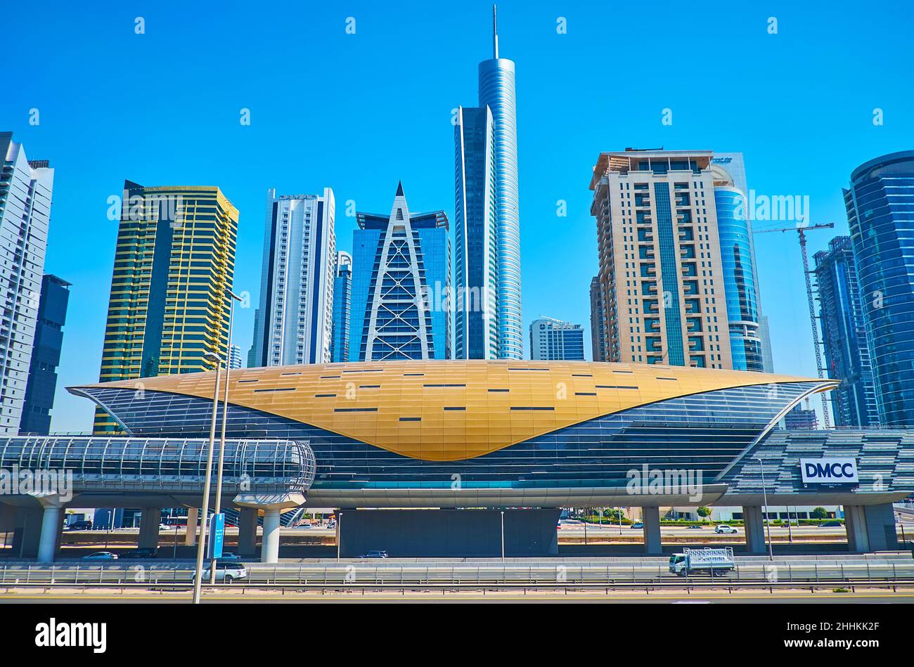 DUBAI, UAE - MARCH 7, 2020: DMCC Metro Station in front of the glass ...