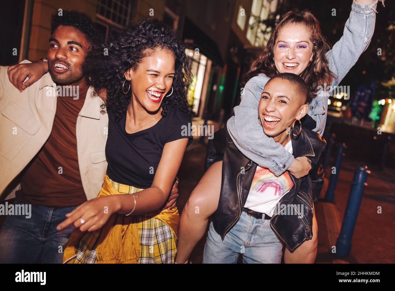 Young people laughing and living their best lives in the city. Happy ...