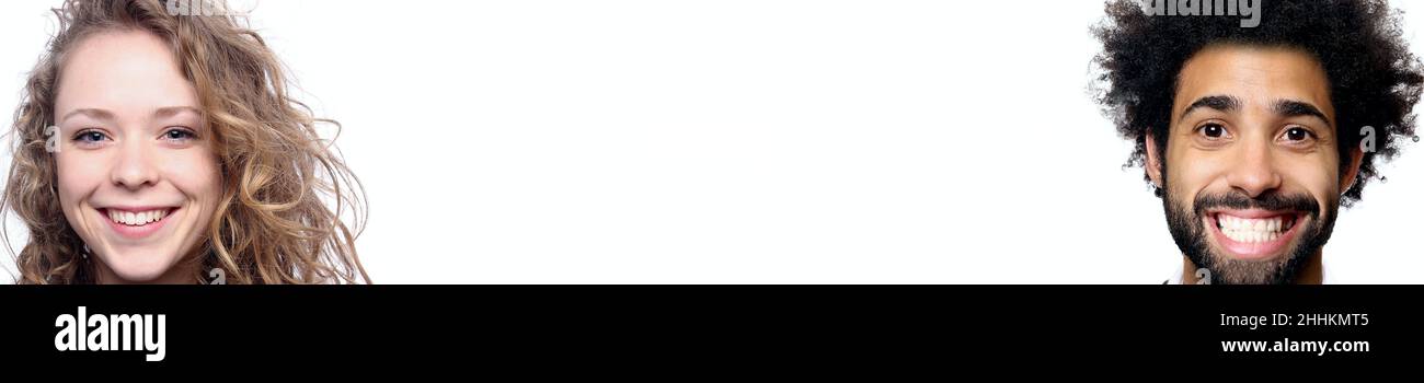 Two people in front of a white background with a white space in between ...