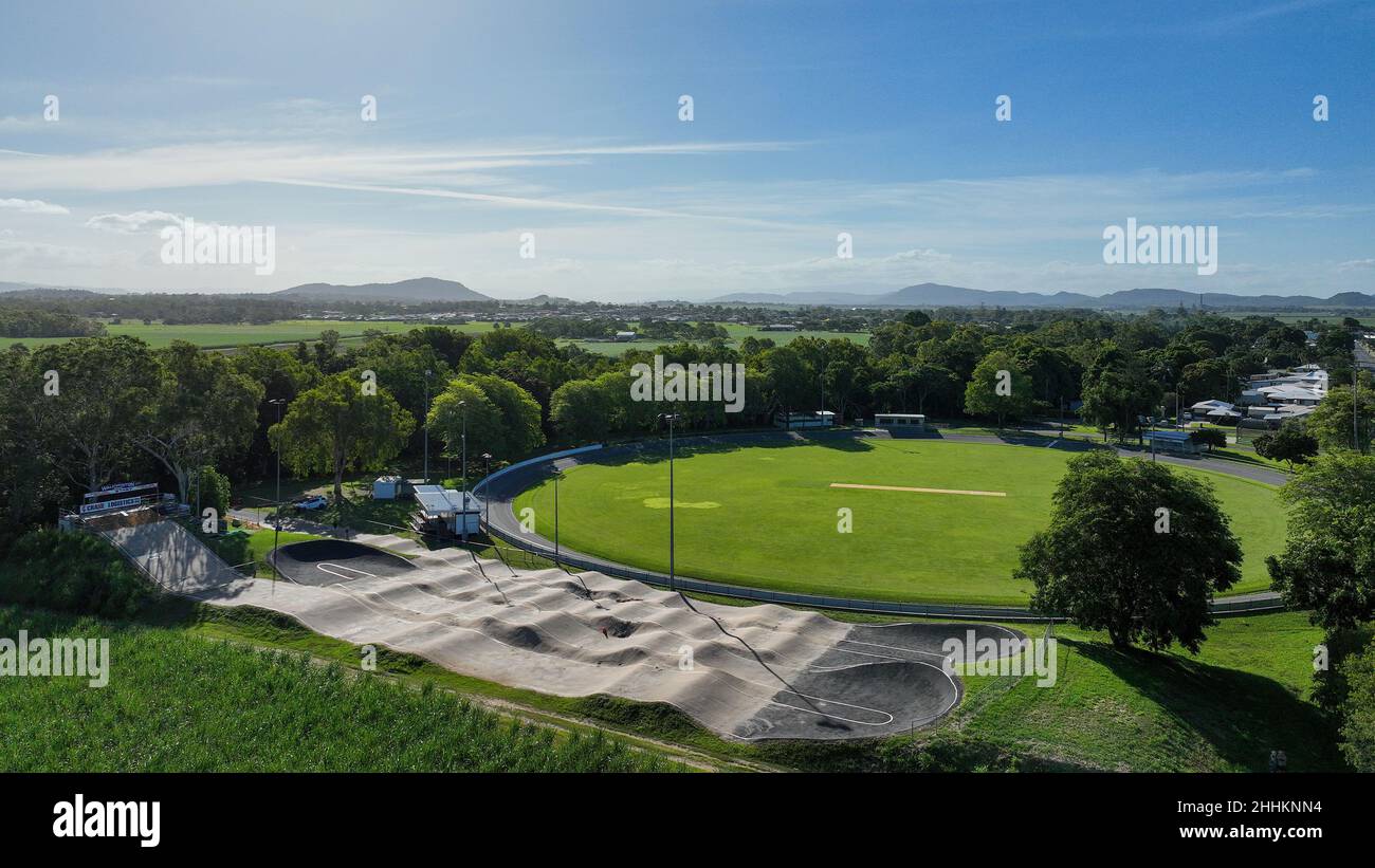 Aerial view of a velodrome and a bmx bicycle track nestled amongst ...
