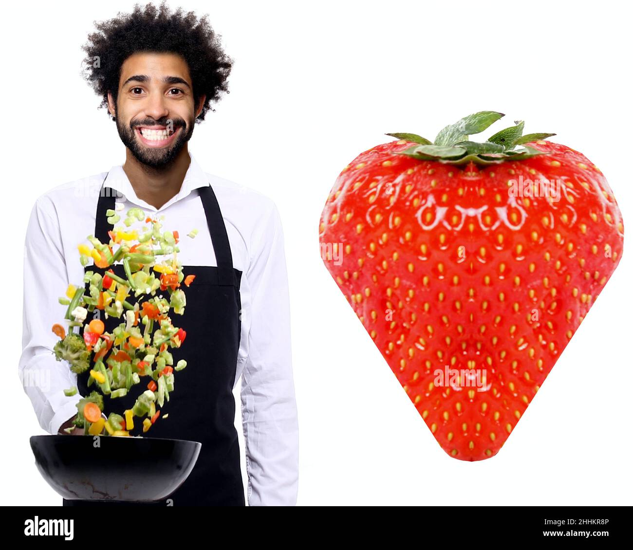 Beautiful man with a strawberry Stock Photo - Alamy