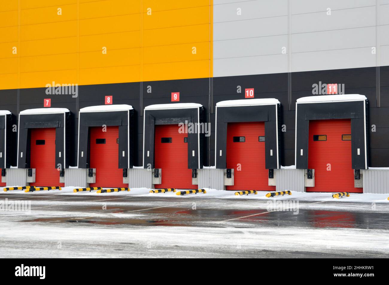 Exterior view of a large warehouse in winter. Loading docks Stock Photo ...