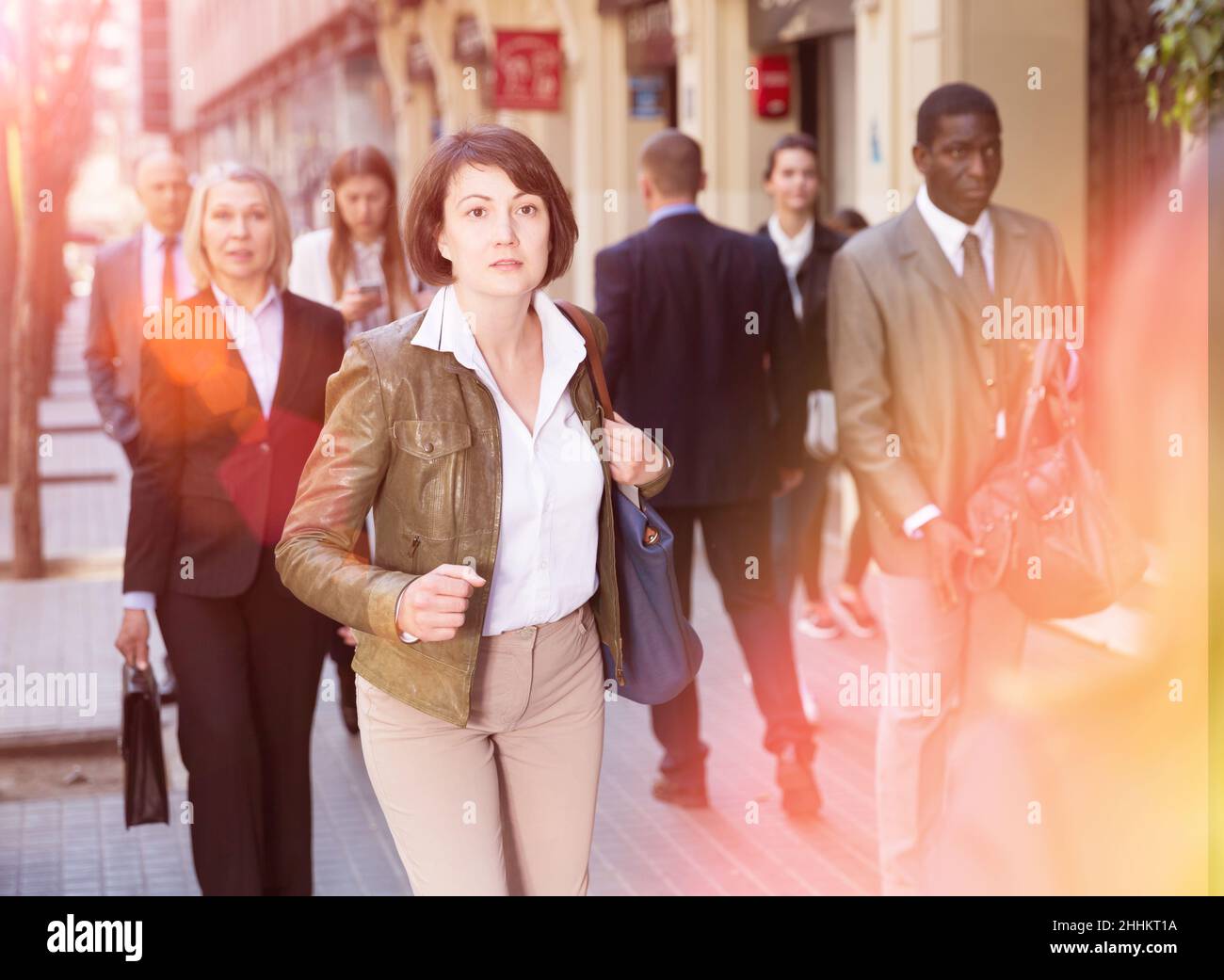 Hurrying into office building hi-res stock photography and images - Alamy