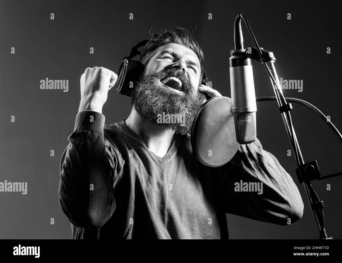 Singer Singing Rock Expression Face Close Up Sound Producer Recording singer-singing-rock-expression-face-close-up-sound-producer-recording
