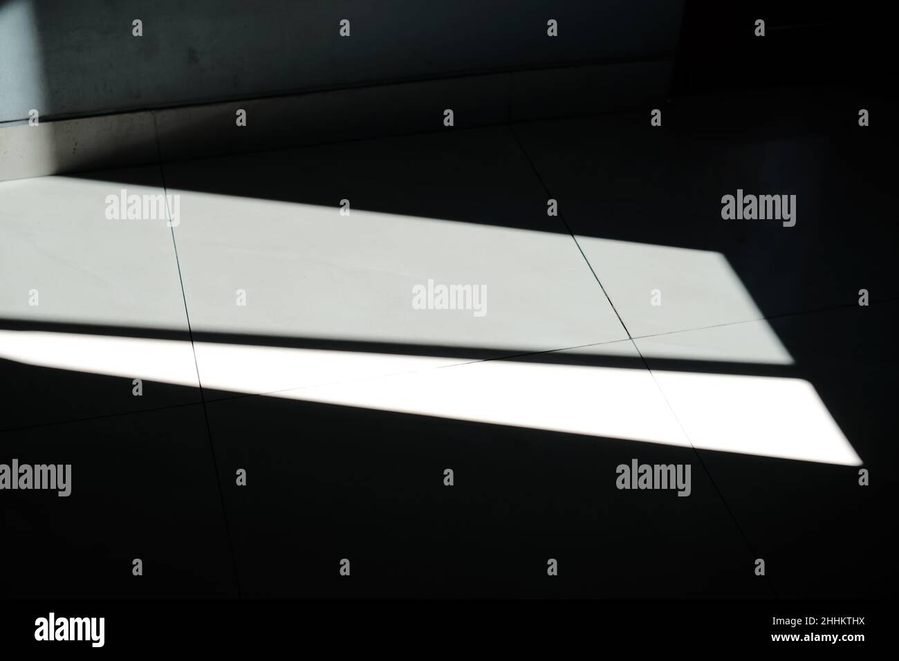 the shadow of the light from behind the window Stock Photo - Alamy