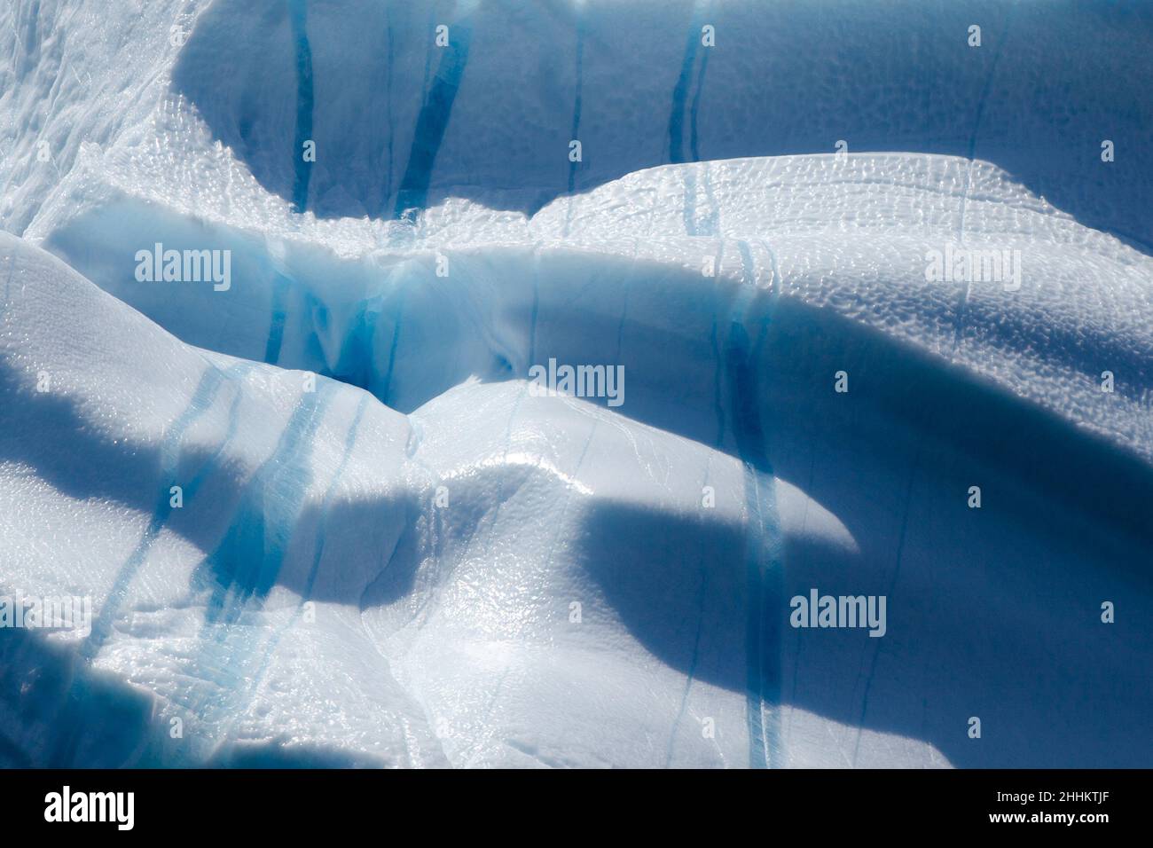 Iceberg showing different colored ice Stock Photo - Alamy