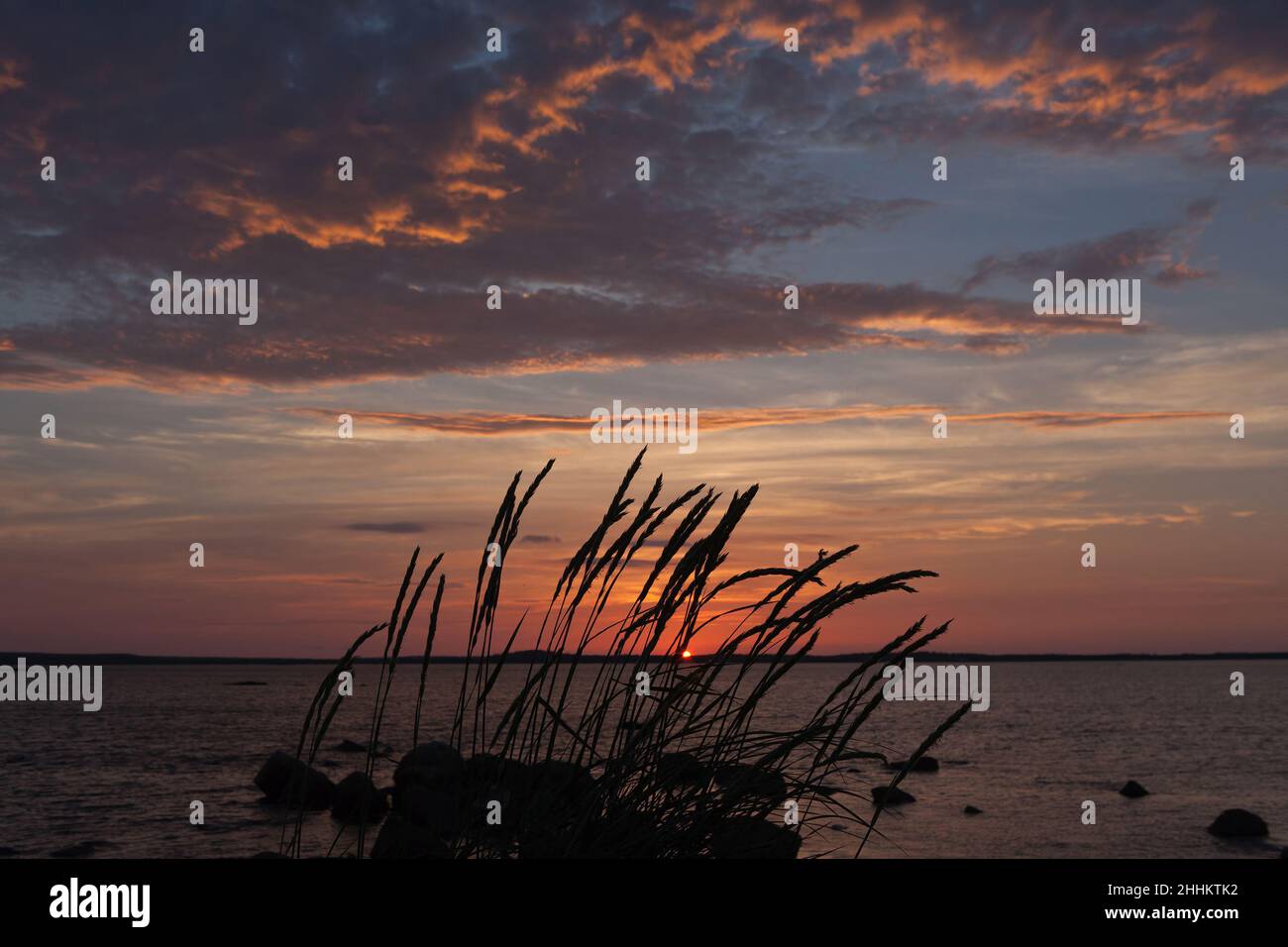 Newfoundland dusk clouds shoreline hi-res stock photography and images ...
