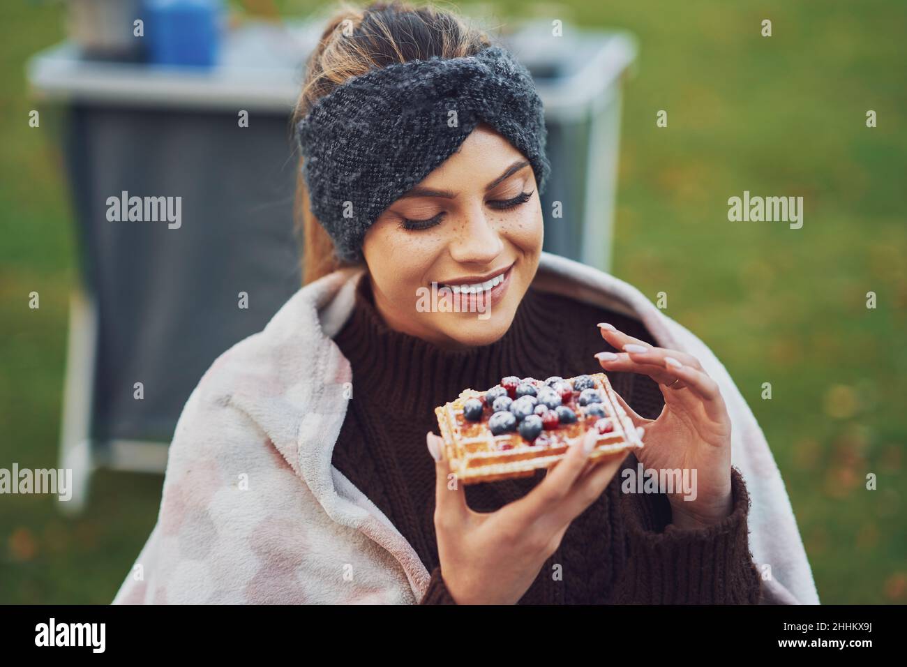Young nice couple having fun on camping while cooking and eating Stock ...