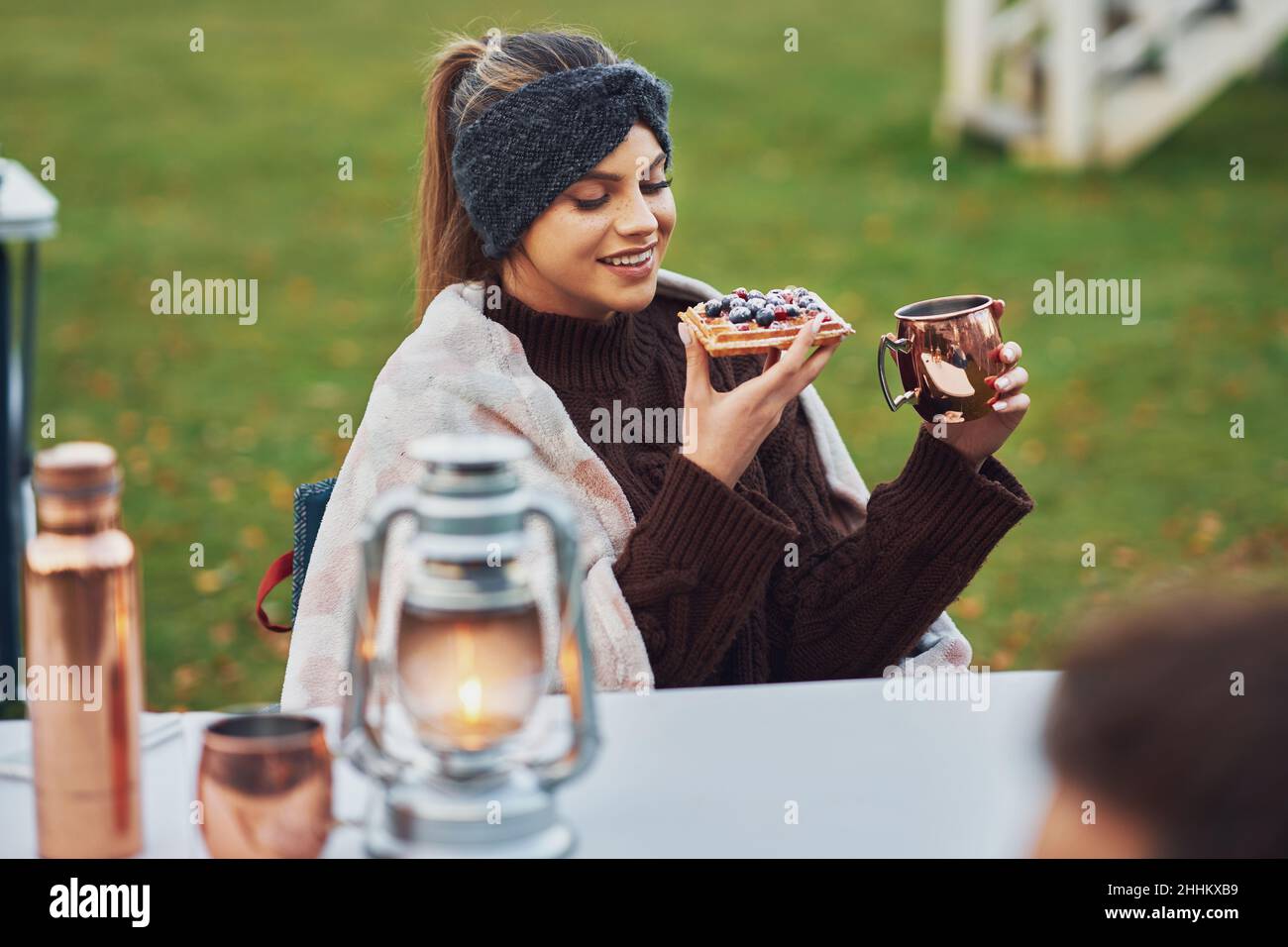 Young nice couple having fun on camping while cooking and eating Stock ...