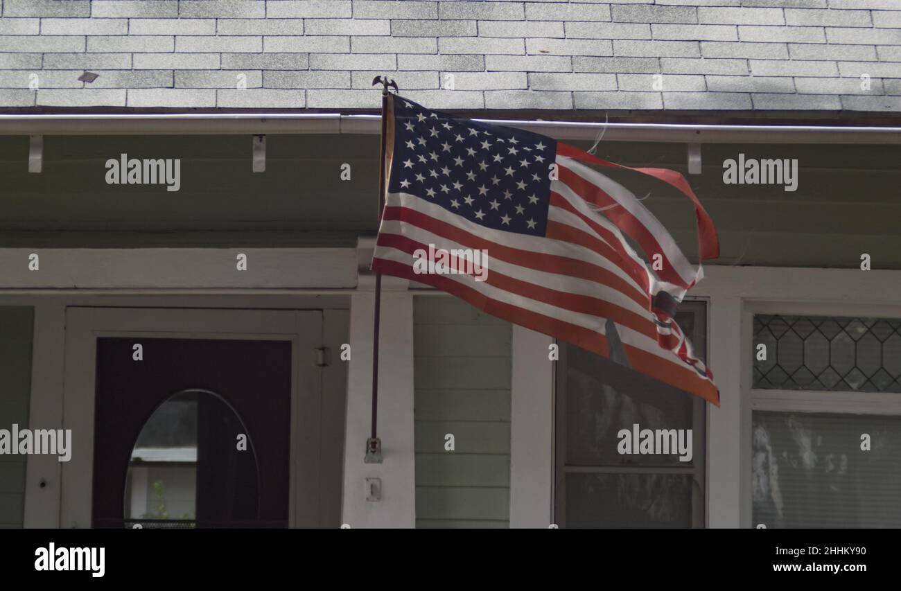 Frayed red flag hi-res stock photography and images - Alamy
