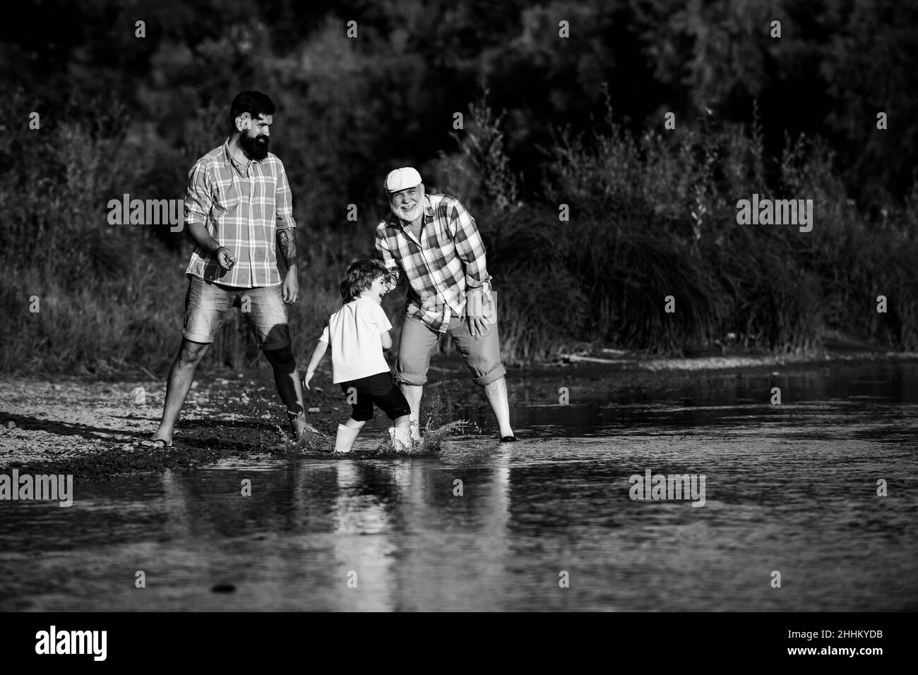 Three generation family. Skipping Stones with Dad adn Granddad. Three ...