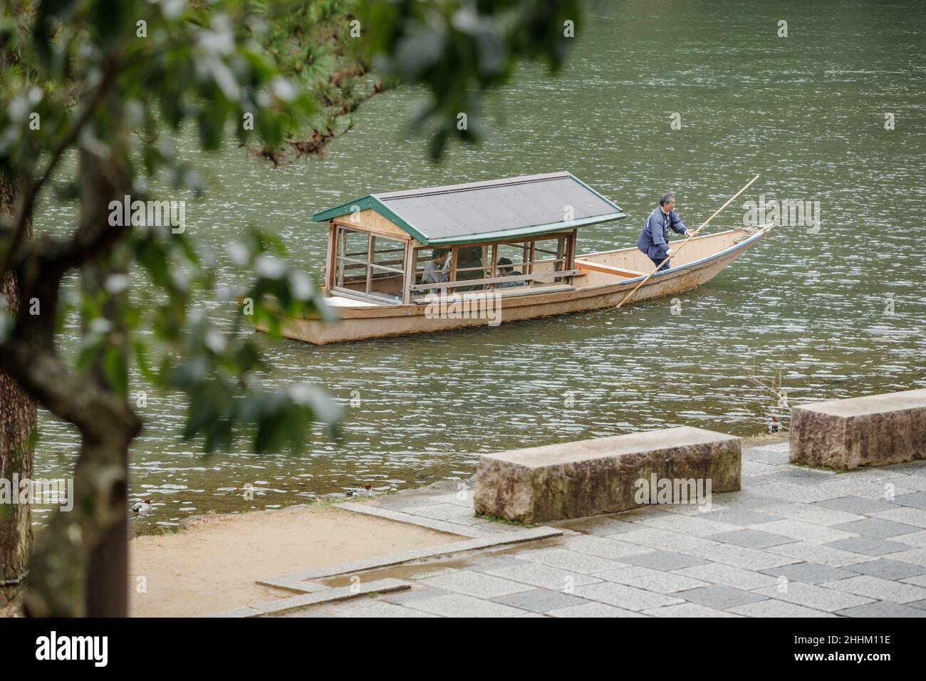 Traditional Japanese riverboat for tourists in Kyoto, Arashiyama going ...
