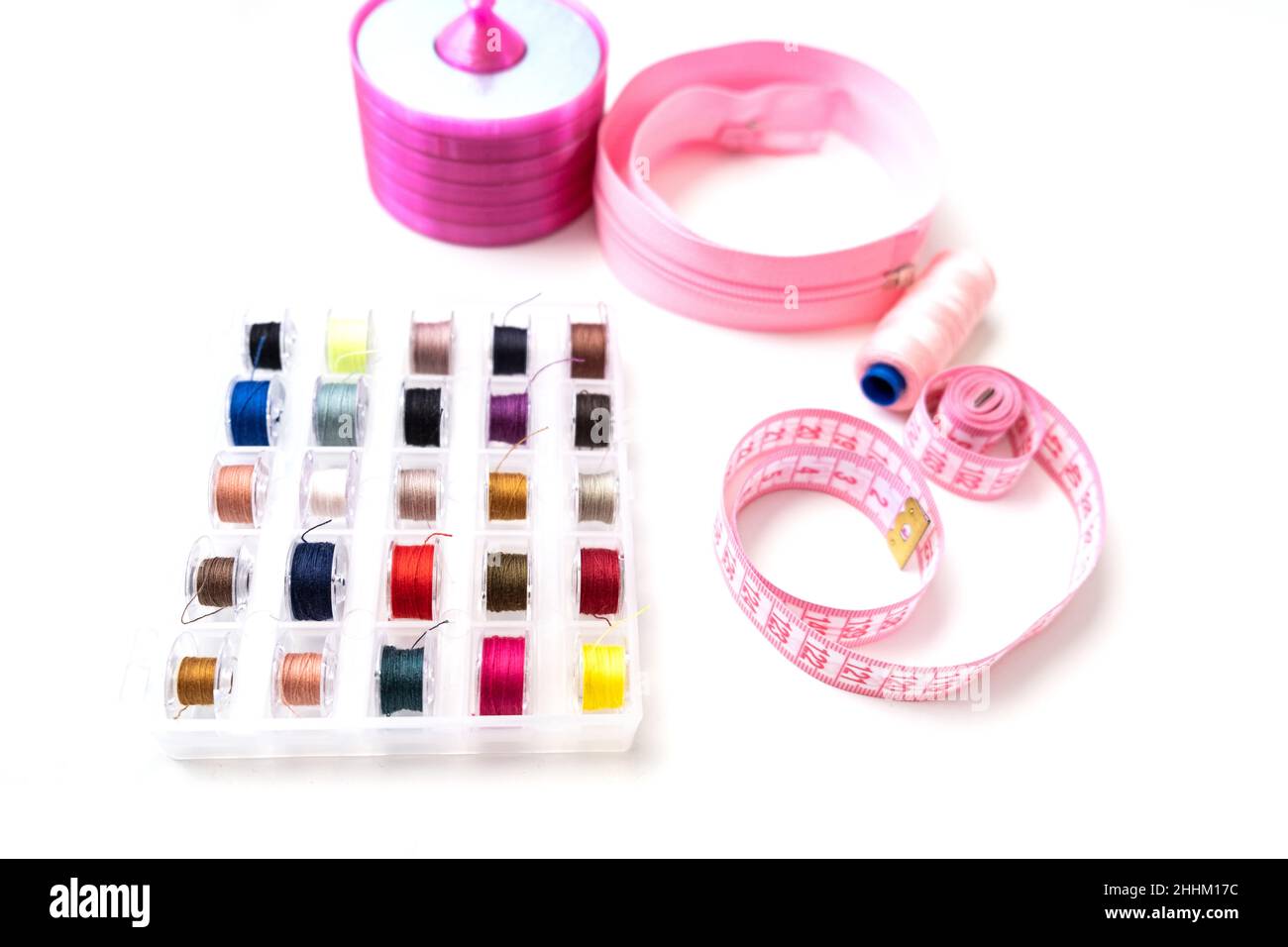 taking measurements on the fabric. Seamstress sewing on the sewing ...