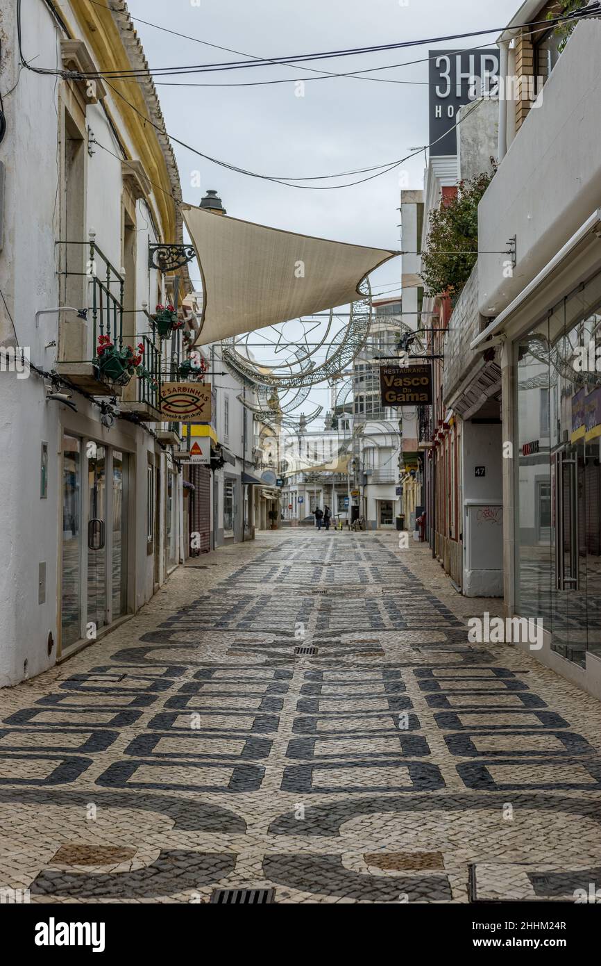 Old street with shops and buildings of Faro, Portugal Stock Photo - Alamy