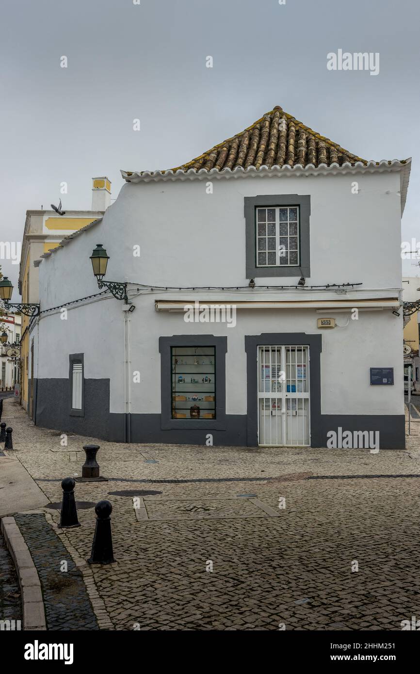 Old buildings of Faro center during a rainy day in Portugal Stock Photo ...
